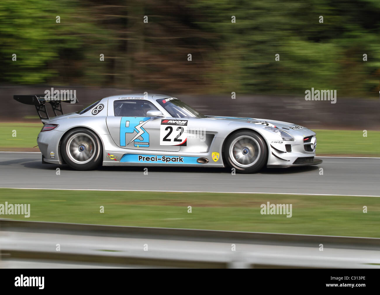 Mercedes race car side panning shot with good speed Stock Photo - Alamy