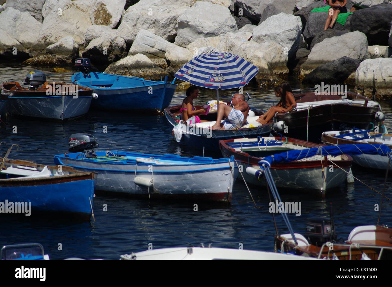 Relaxing in a boat Stock Photo - Alamy