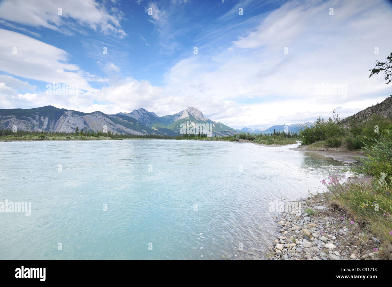 Icy blue glacier river, Rocky Mountains, Alberta, Canada Stock Photo ...