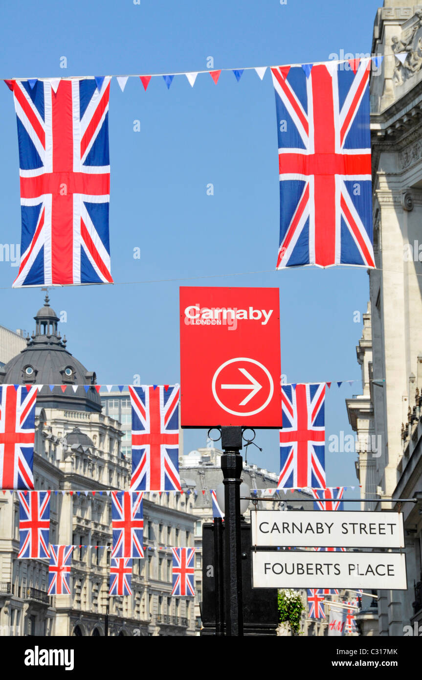 Carnaby Street signs with Union Jack flags and bunting across & above ...