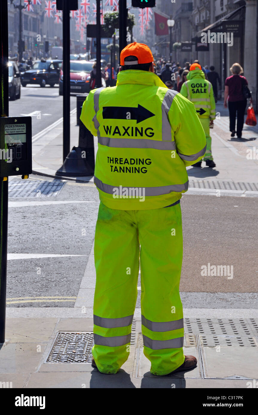 Men wearing high visibility clothes in Regent Street in answer to ban ...