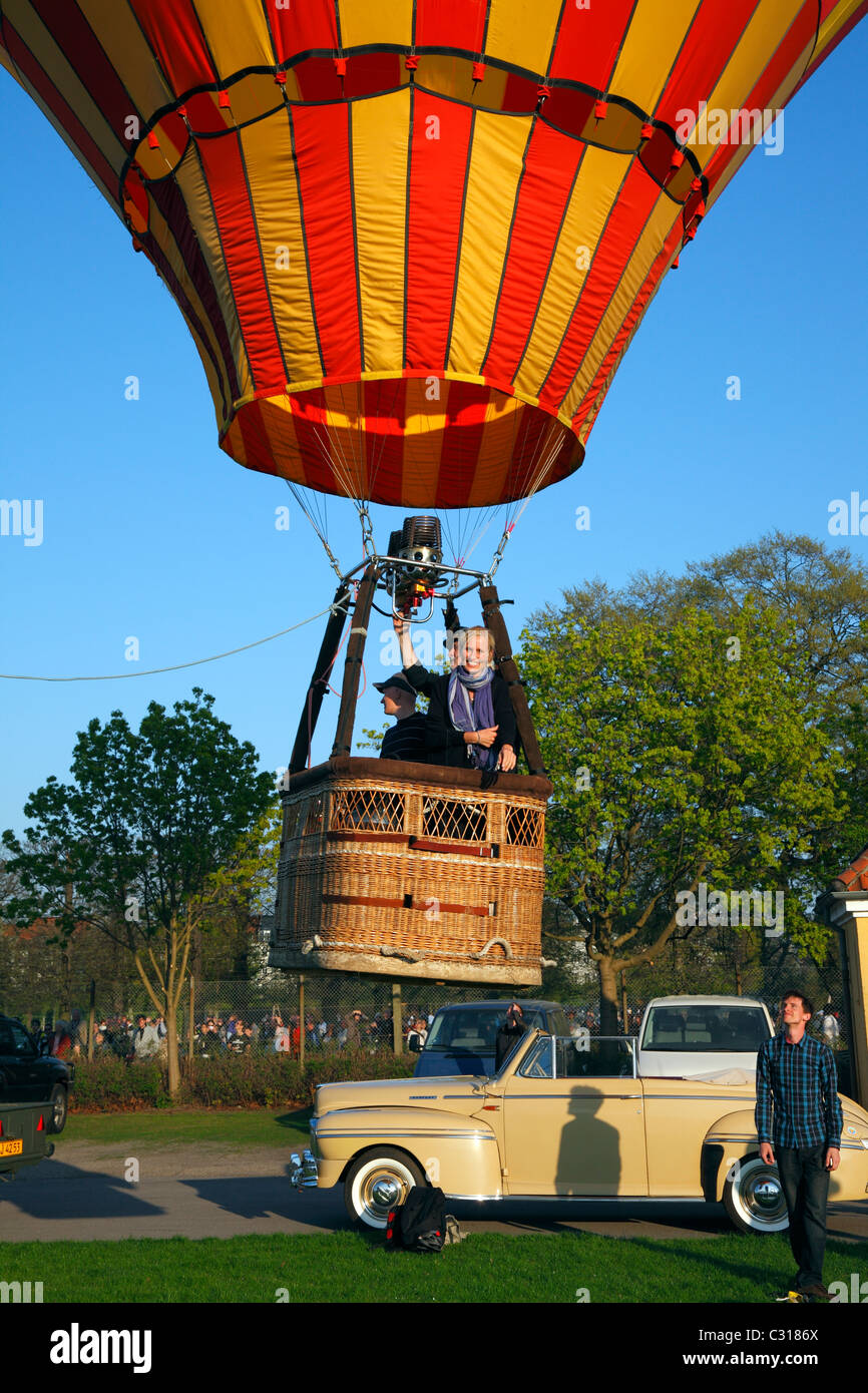 One of 12 hot air balloons in a commemorative ascension on the 200th ...