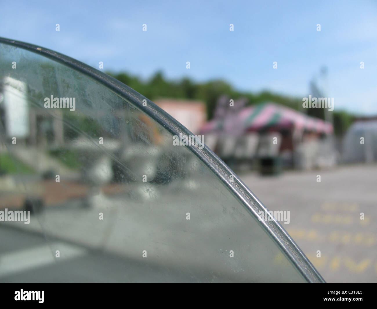 The car window, with a small shop in the background Stock Photo - Alamy