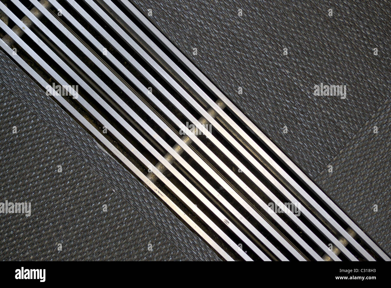View of an air conditioning grid fixed to the floor Stock Photo - Alamy