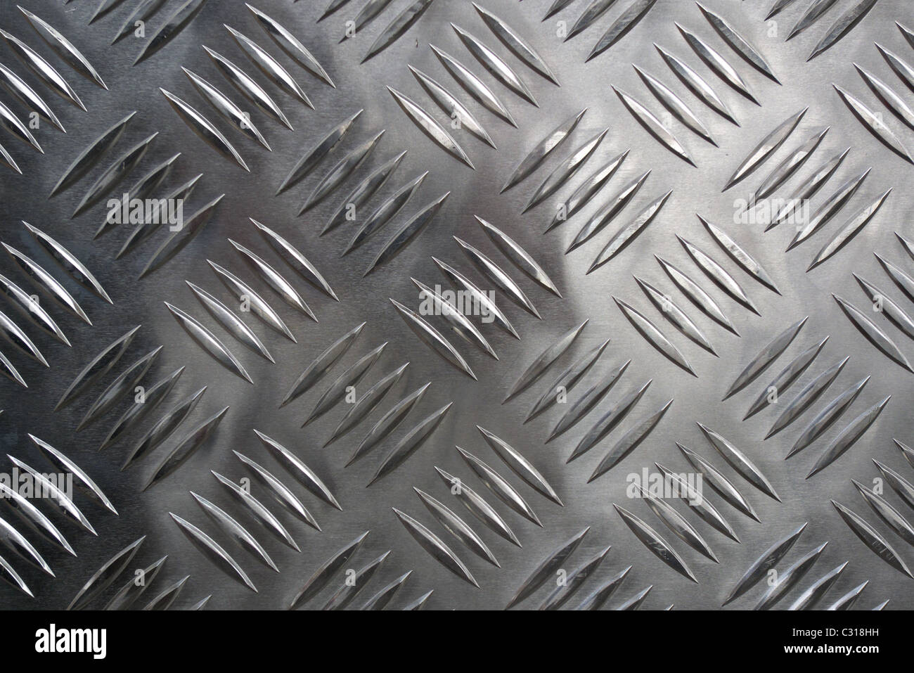 Detail of a new grid of steel placed along a road Stock Photo - Alamy