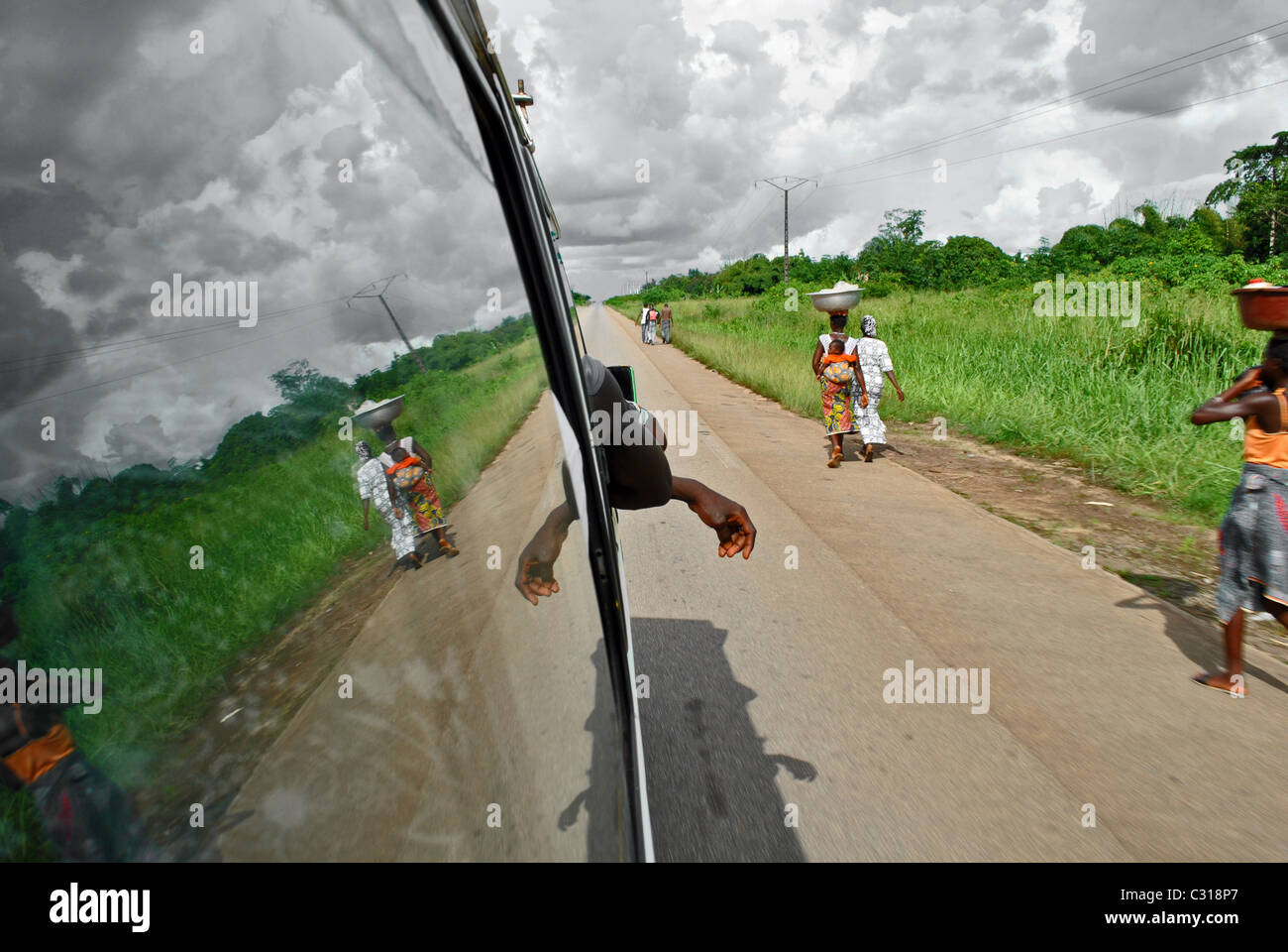 Reflection in bus window in the Ivory Coast, West Africa Stock Photo ...