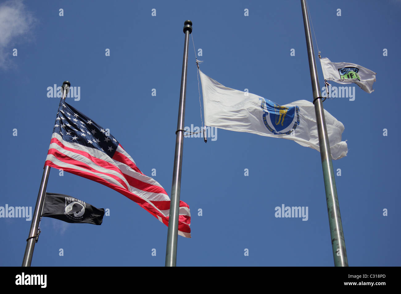 National and state flags flying high in Government Center in Boston ...