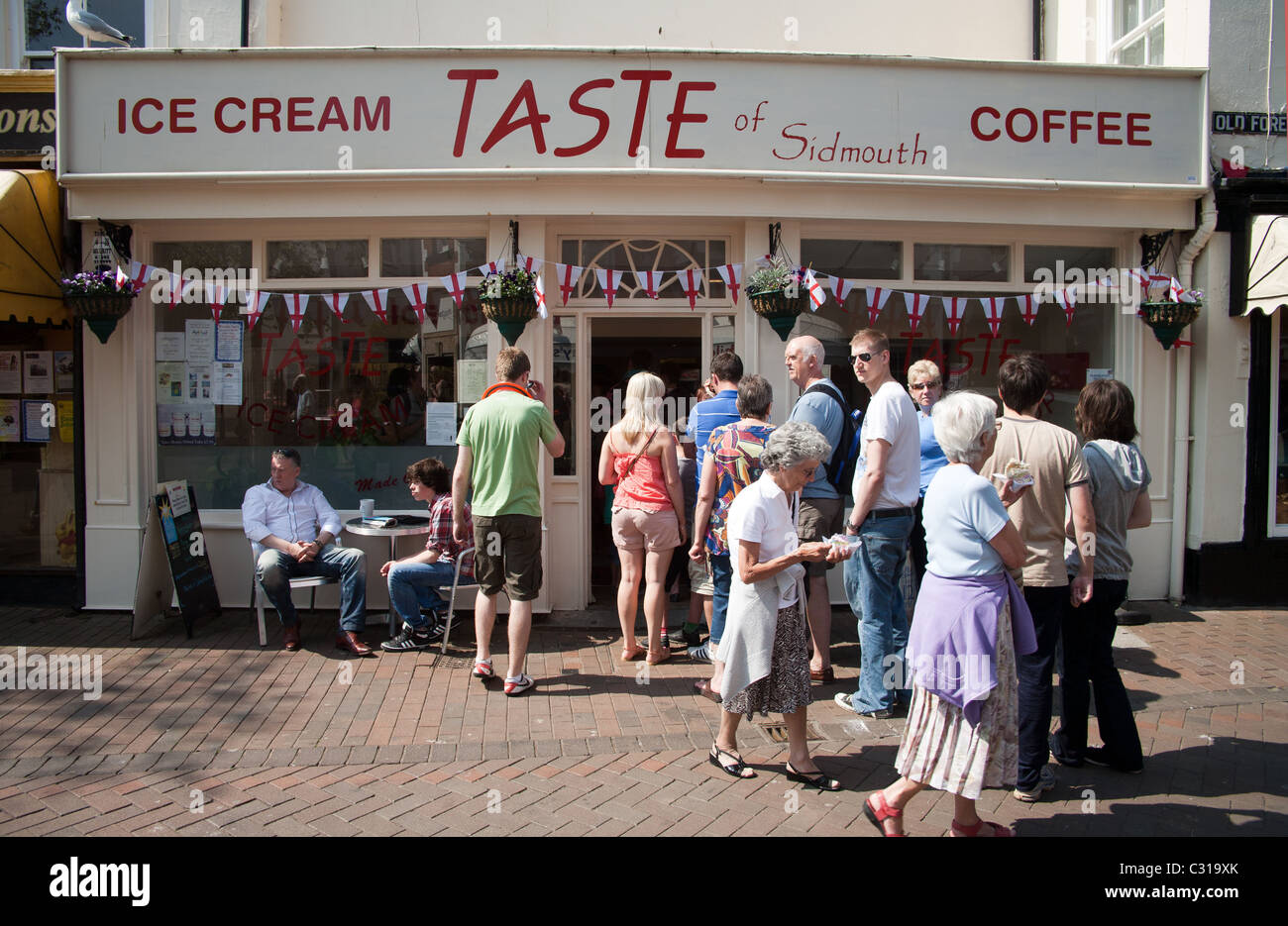 Queue outside a Ice cream shop Sidmouth Stock Photo - Alamy