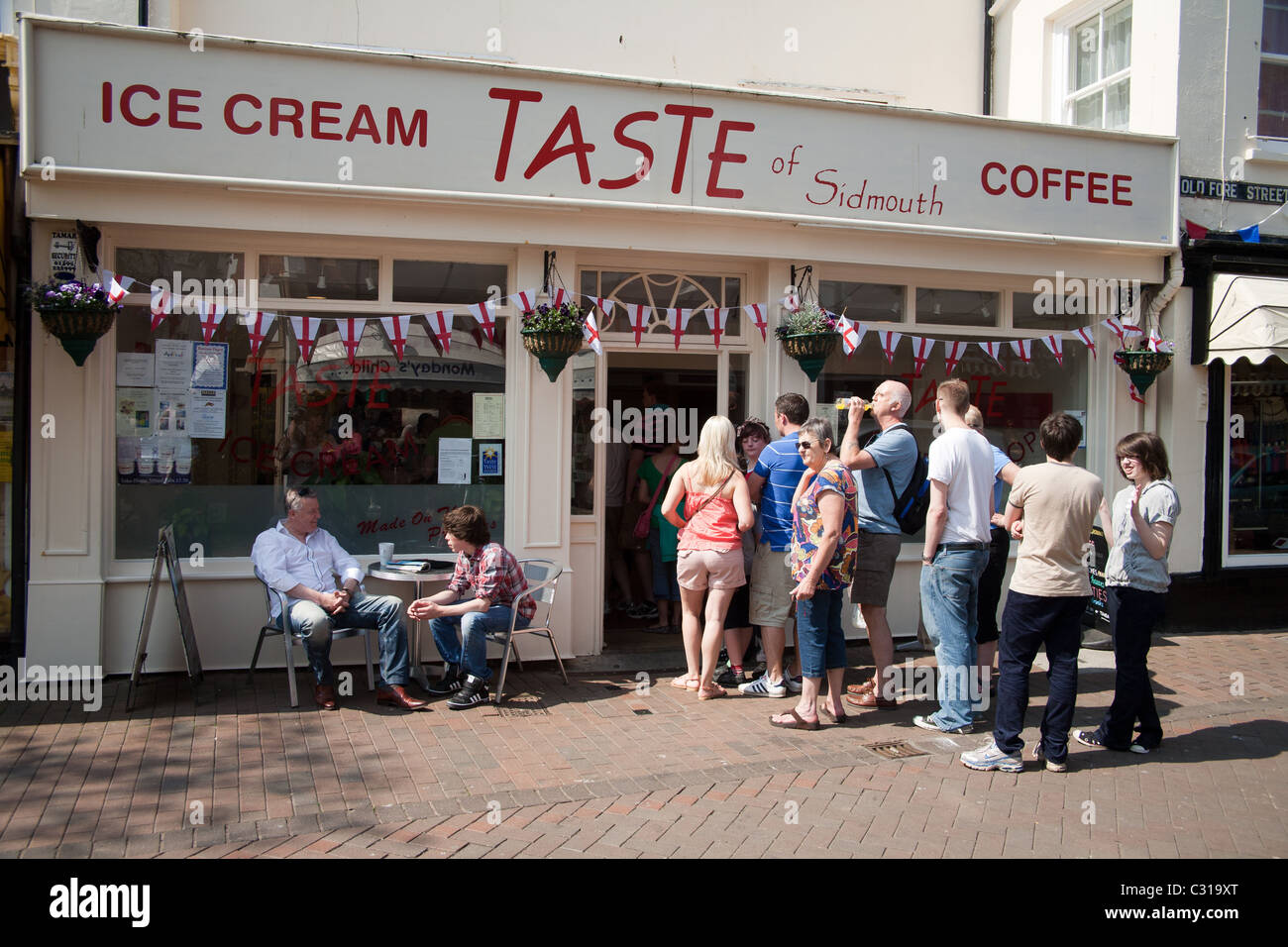 Queue outside a Ice cream shop Sidmouth Stock Photo - Alamy