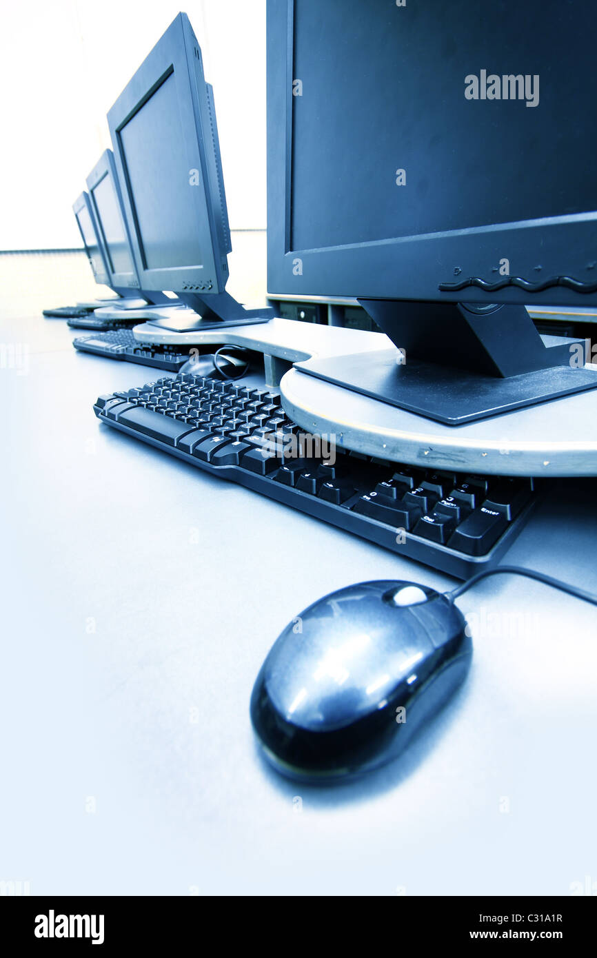 Workplace room computers in row hi-res stock photography and images - Alamy