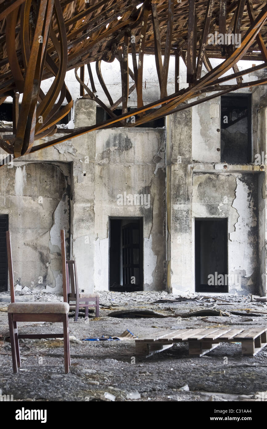 Discarded building, metal roof fall down Stock Photo - Alamy