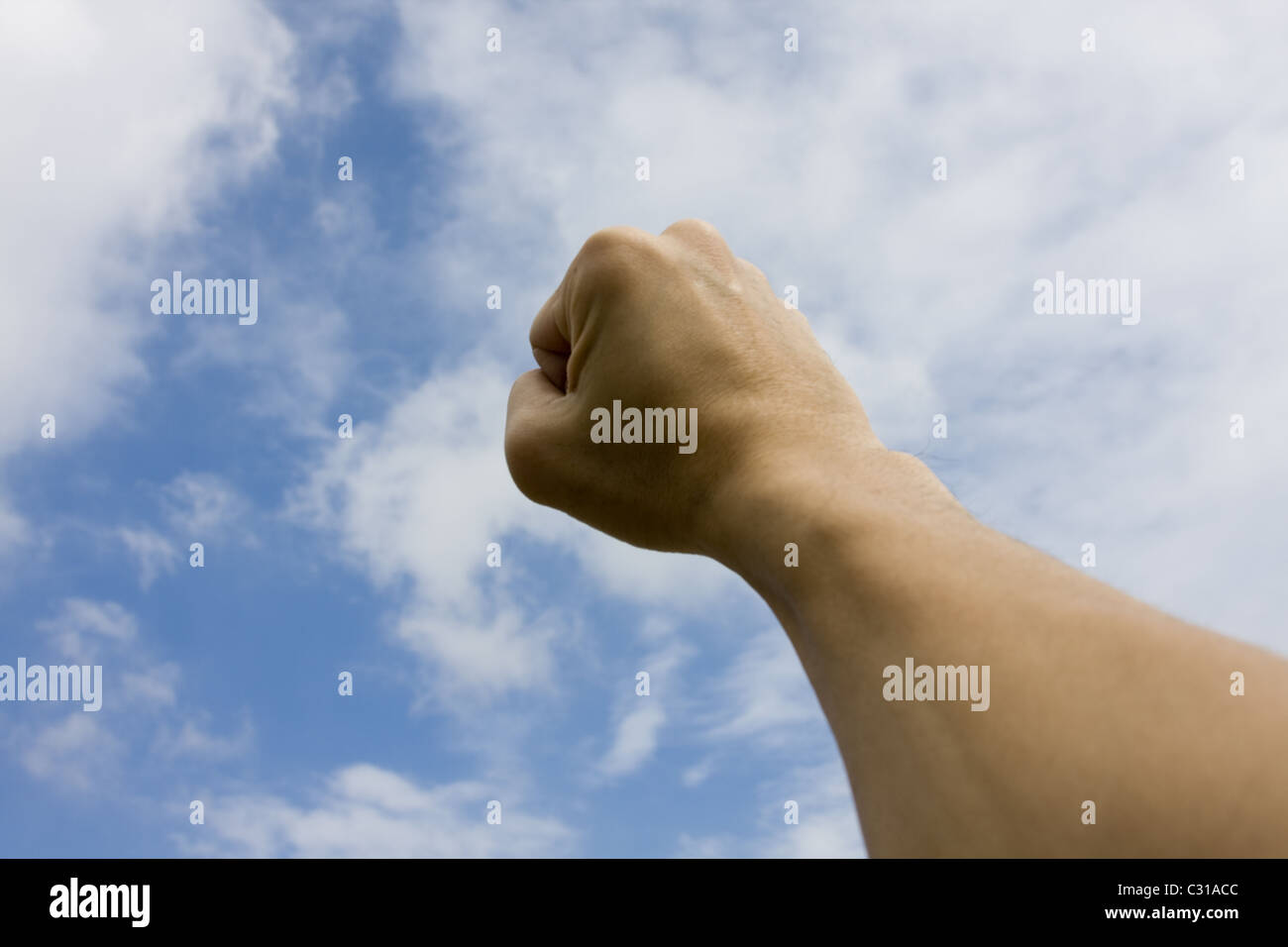 Hand with the Sky Background to show challenge to a fight or contest ...