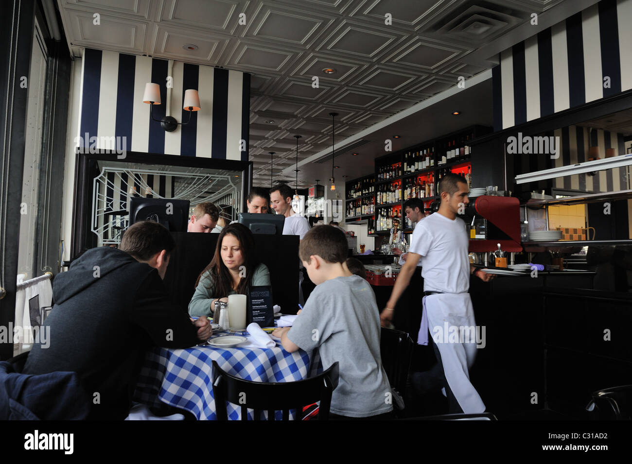 A family dining in a restaurant in Battery Park City, a neighborhood of ...