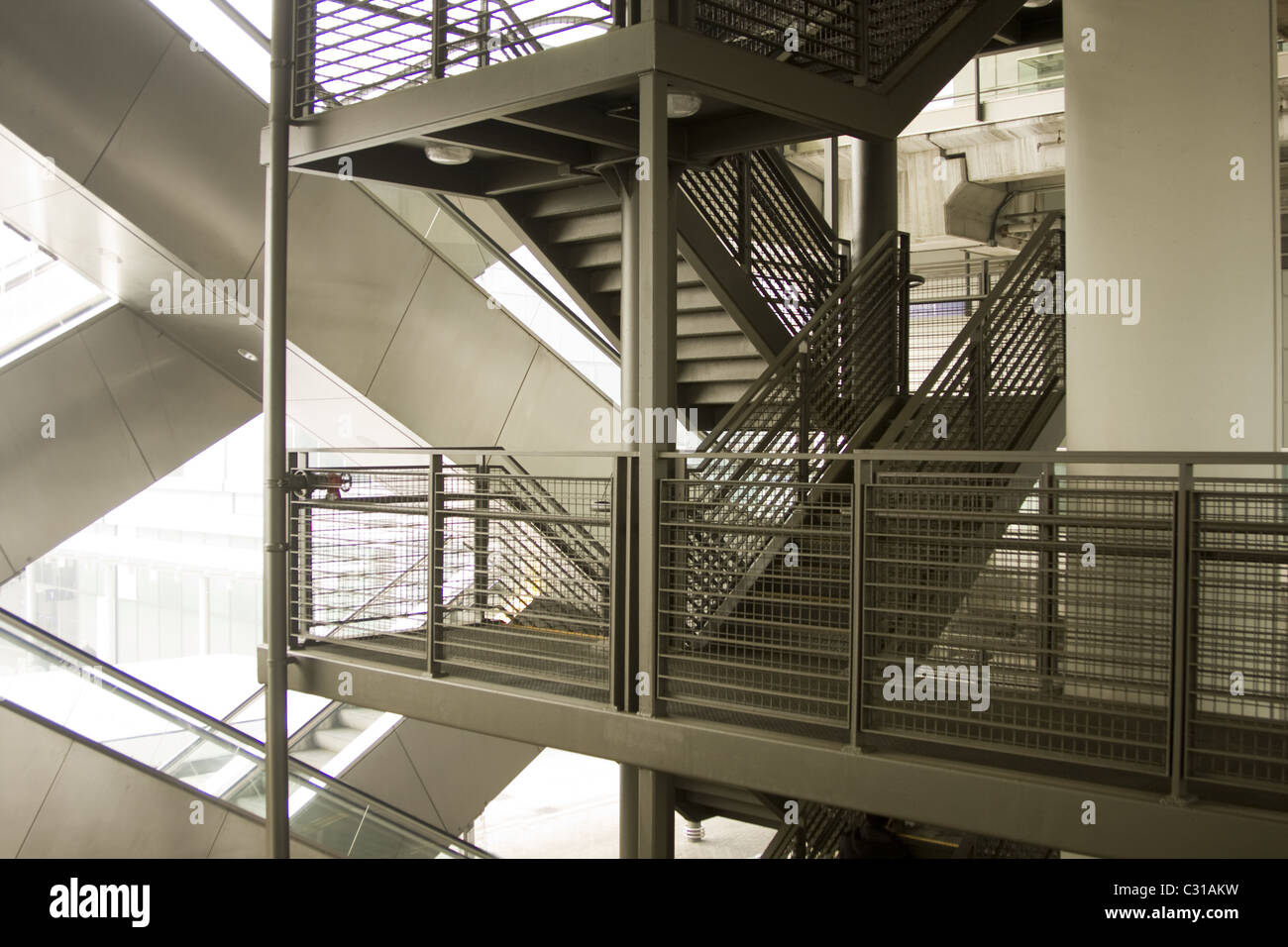 it is a modern escalator and a tradition stairs, made a composition ...