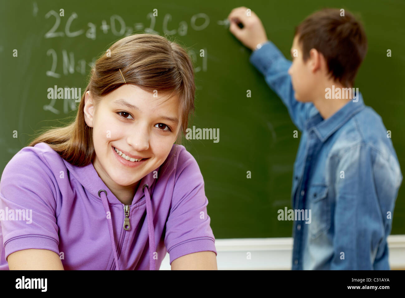 Portrait of smart girl in working environment Stock Photo - Alamy