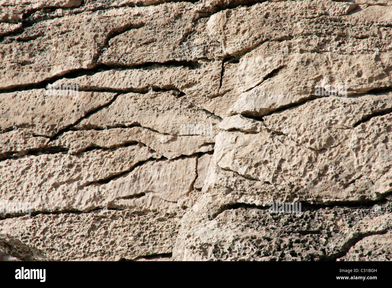 Limestone rock texture cracked and eroded Stock Photo - Alamy