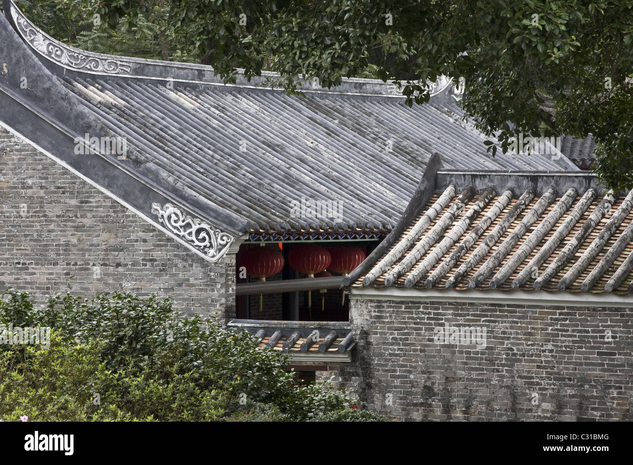 An aerial view over Chinese tiles roofs in an ancient Chinese village ...