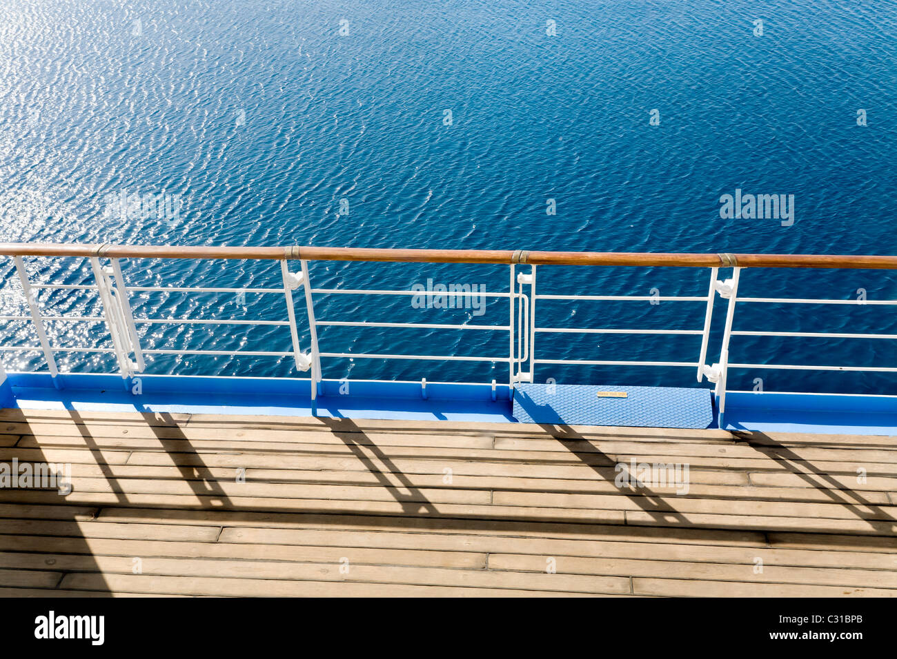 VIEW OF THE WATER FROM THE EMPTY DECK OF A CRUISE SHIP Stock Photo - Alamy