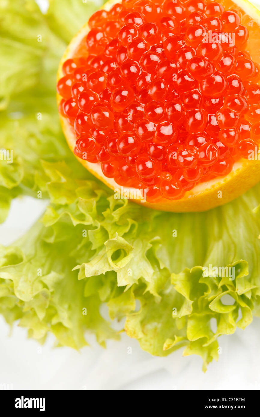 Caviar served on fresh lemon Stock Photo - Alamy