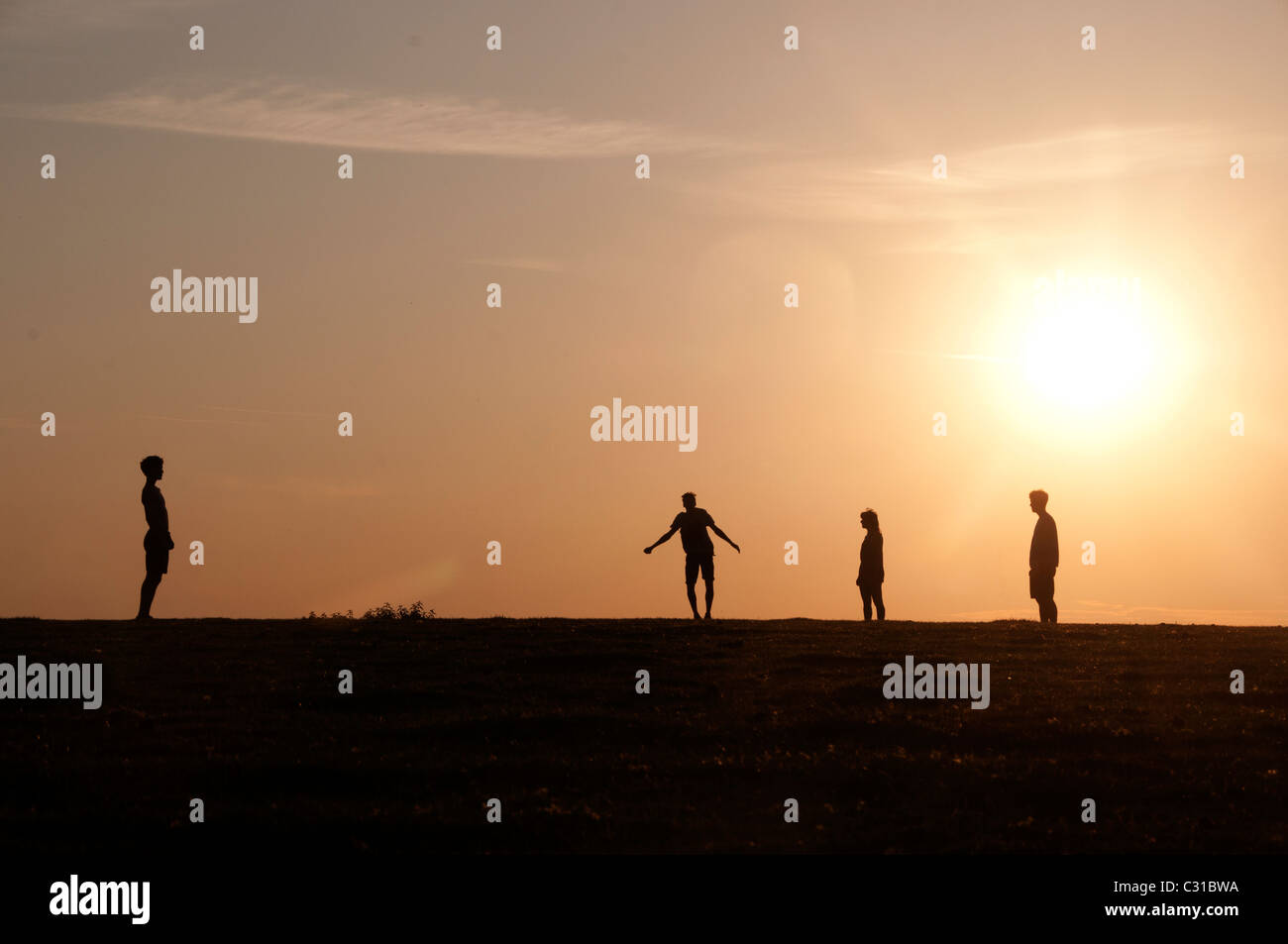 Active people at sunset hi-res stock photography and images - Alamy
