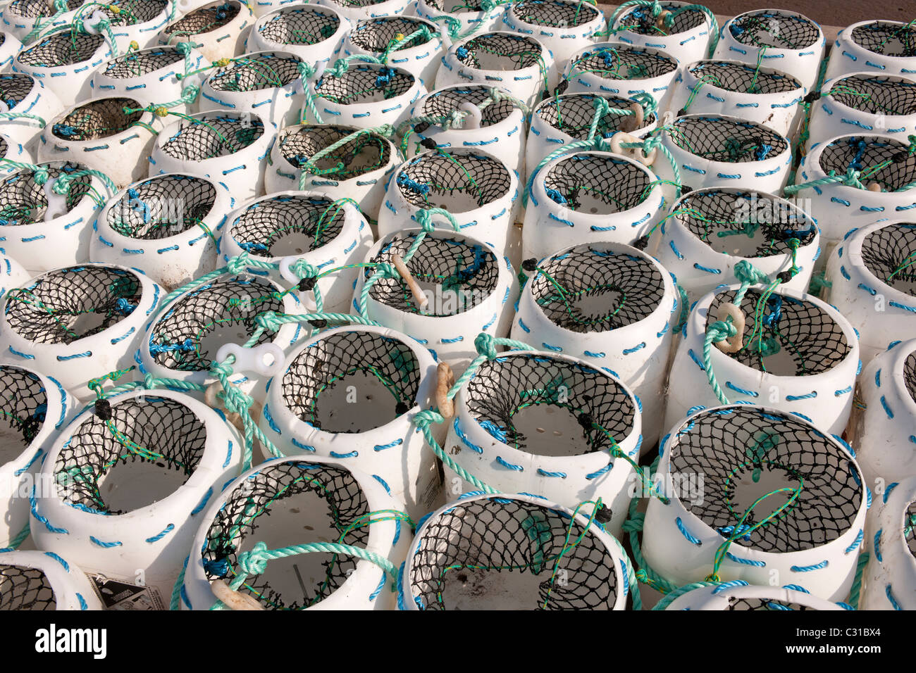 modern lobster pots made from reused plastic containers, quayside ...