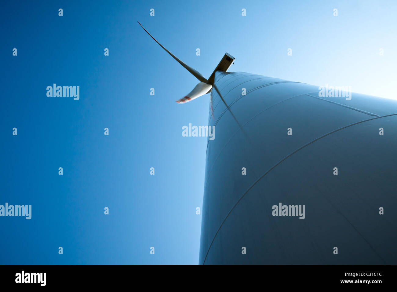 Power generating wind turbines throwing up to the sky Stock Photo - Alamy