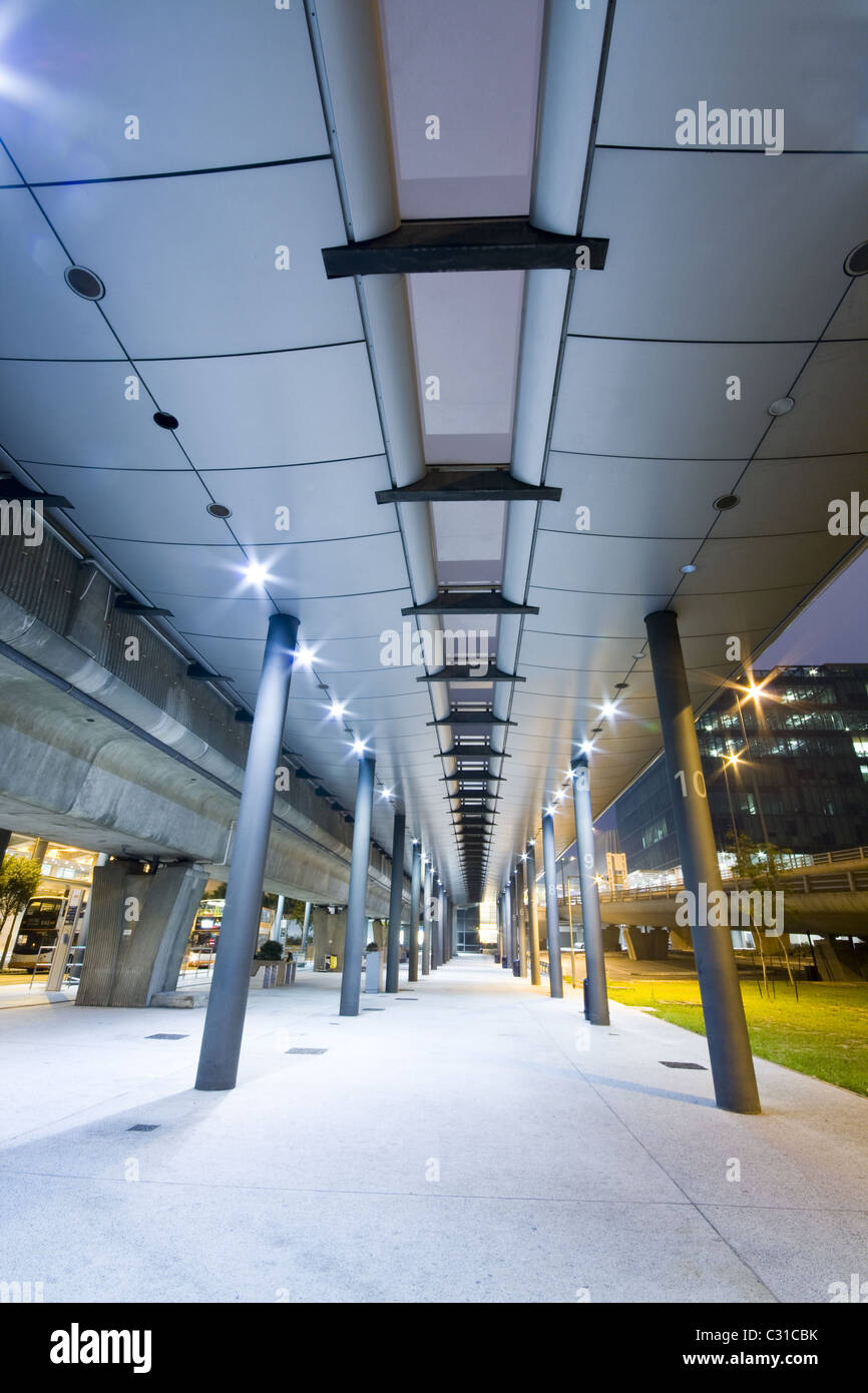 Perspective of the passage at business centre Stock Photo - Alamy