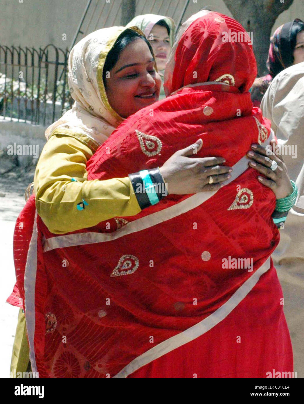 Christian women hug to each at a church on occasion of the Easter ...