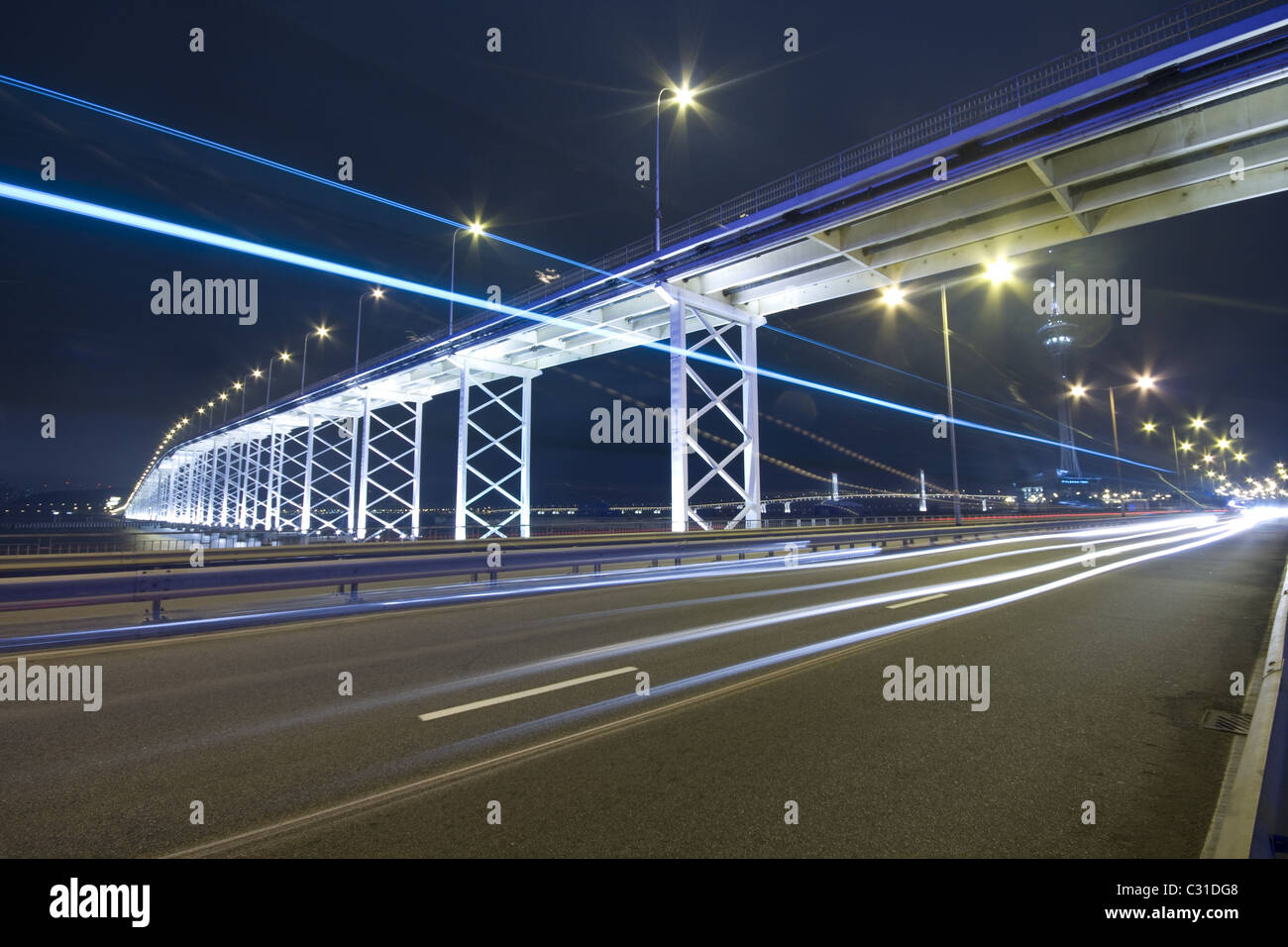 it is a highway under the bridge in macau Stock Photo - Alamy