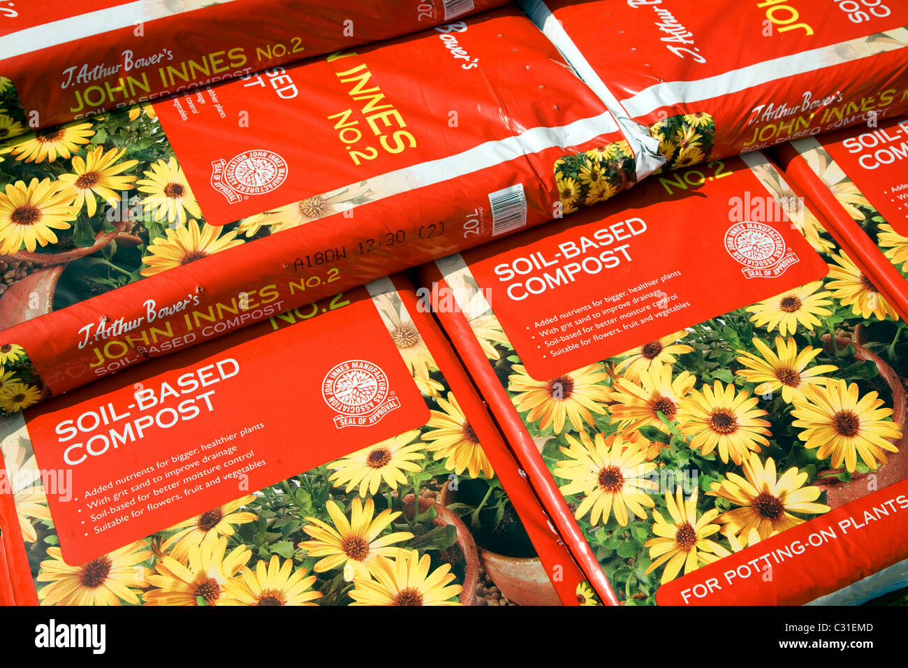 Bags pile Innes soil based compost Stock Photo - Alamy