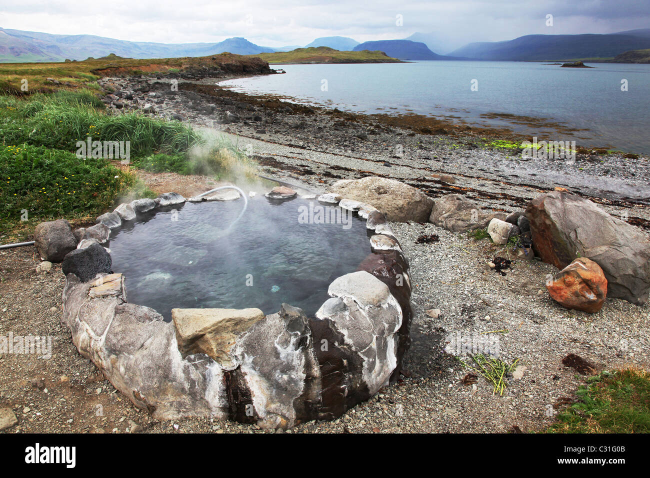 HOT GEOTHERMAL SPRING NEAR THE HVALFJORDUR FJORD OR WHALE-FJORD IN THE ...