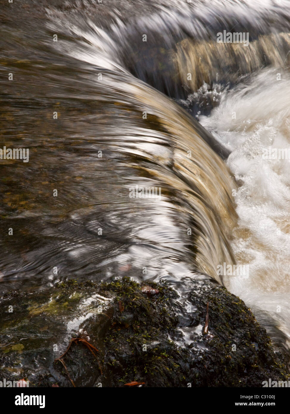 Water splashing over rocks hi-res stock photography and images - Alamy
