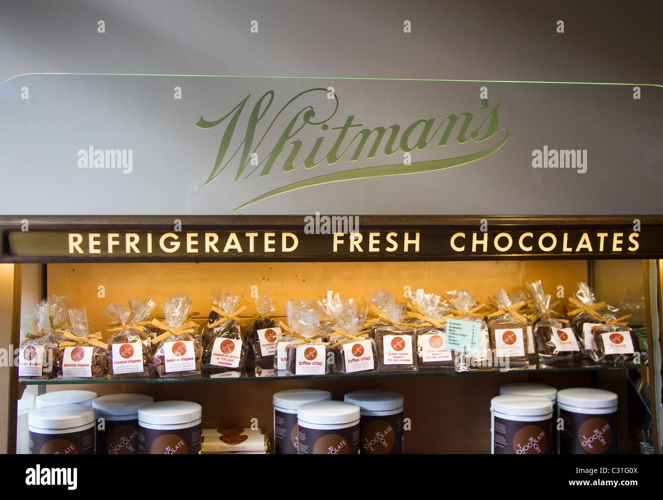 Variety of chocolates on display Stock Photo - Alamy