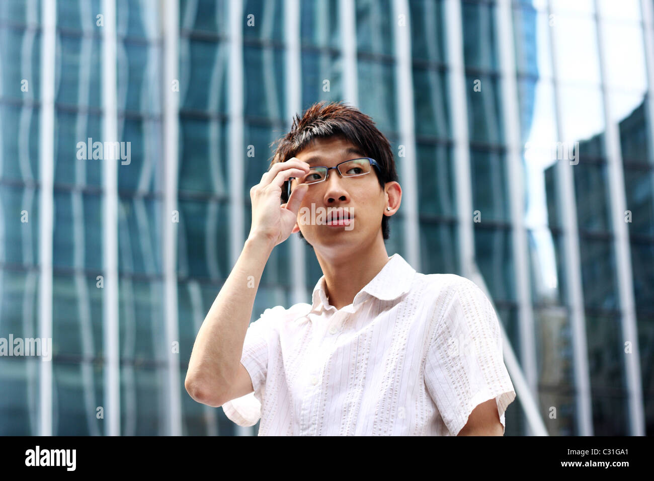 Young man asian glasses walk hi-res stock photography and images - Alamy