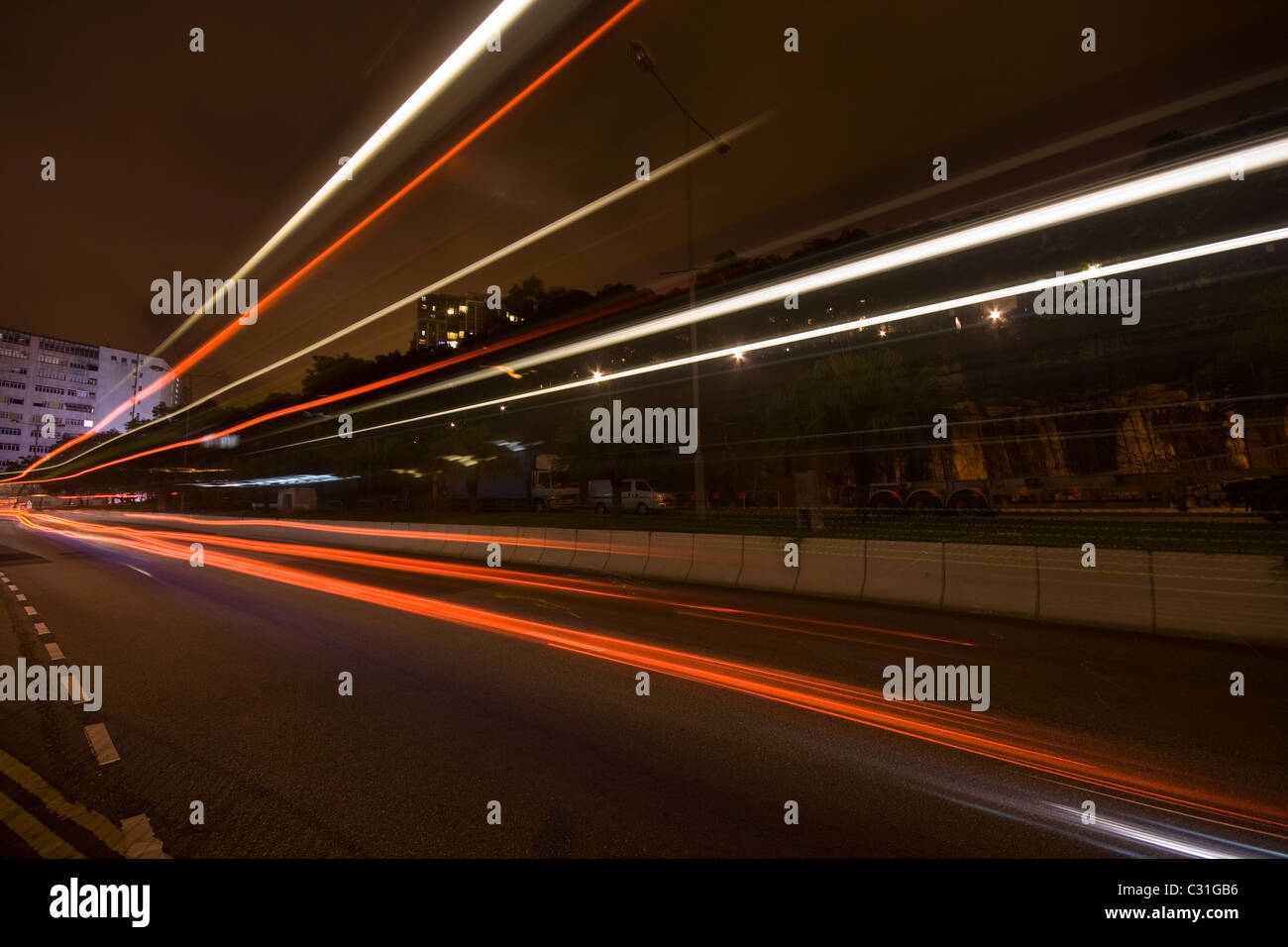 Traffic on the move at night Stock Photo - Alamy