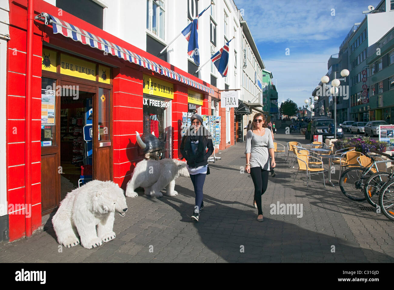 YOUNG WOMEN ON SKIPAGATA, THE MAIN SHOPPING STREET IN THE AKUREYRI TOWN ...