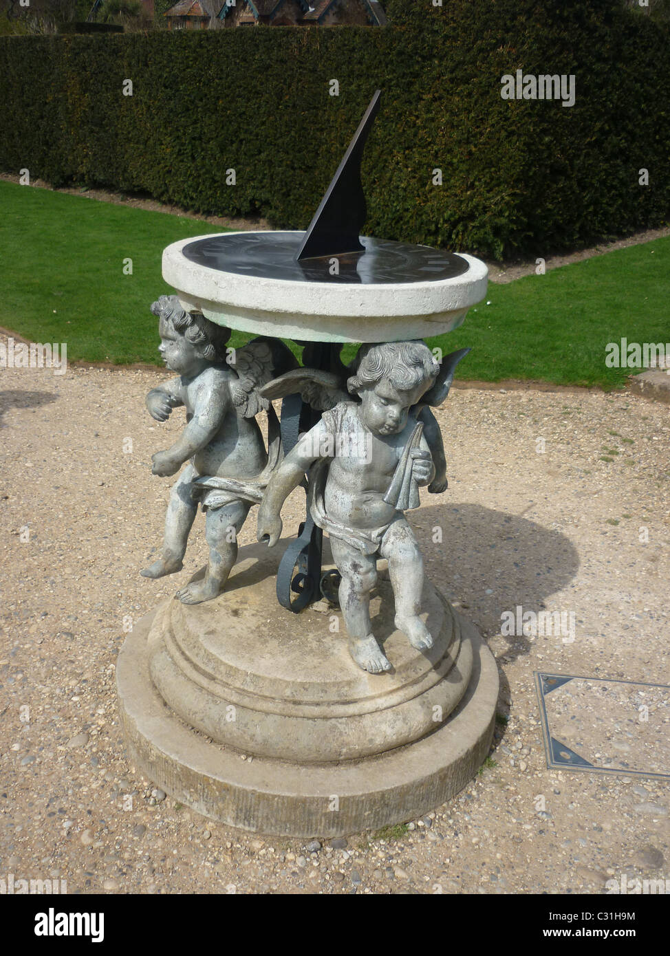 Sundial in public garden Stock Photo - Alamy
