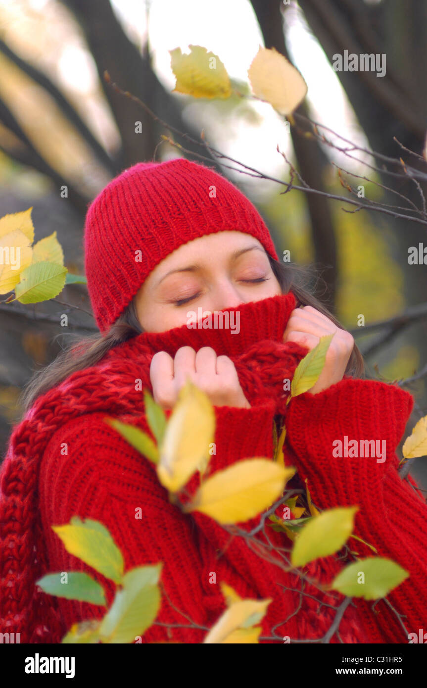 ALL MUFFLED UP, A YOUNG WOMAN REGENERATES HERSELF IN THE FOREST IN ...