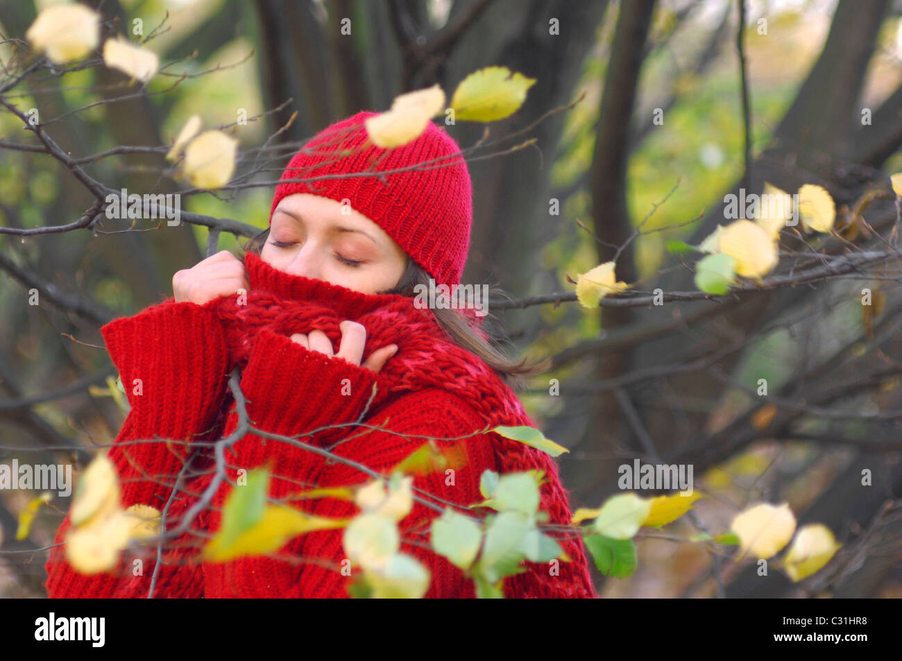 ALL MUFFLED UP, A YOUNG WOMAN REGENERATES HERSELF IN THE FOREST IN ...