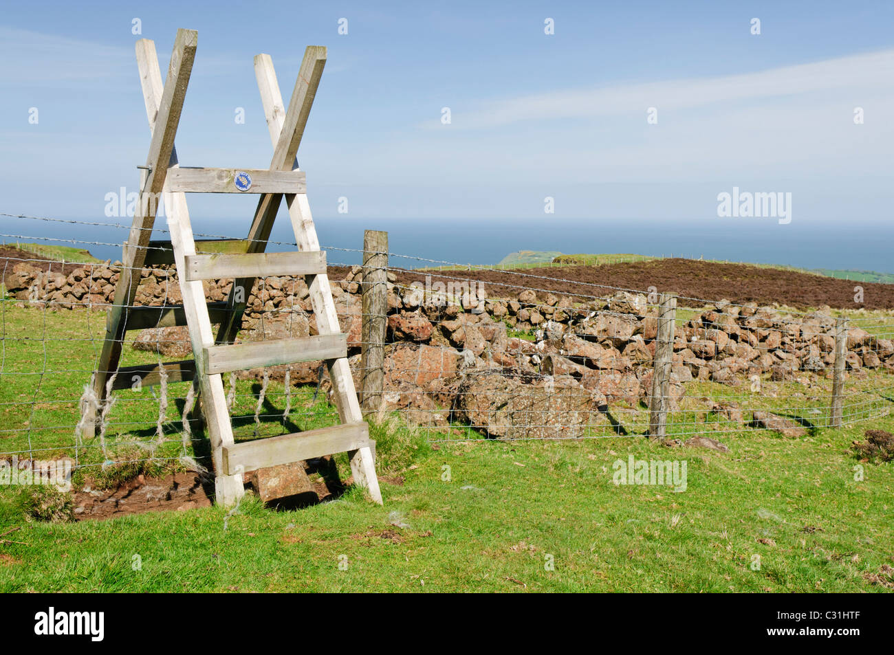 Ladder over fence hi-res stock photography and images - Alamy