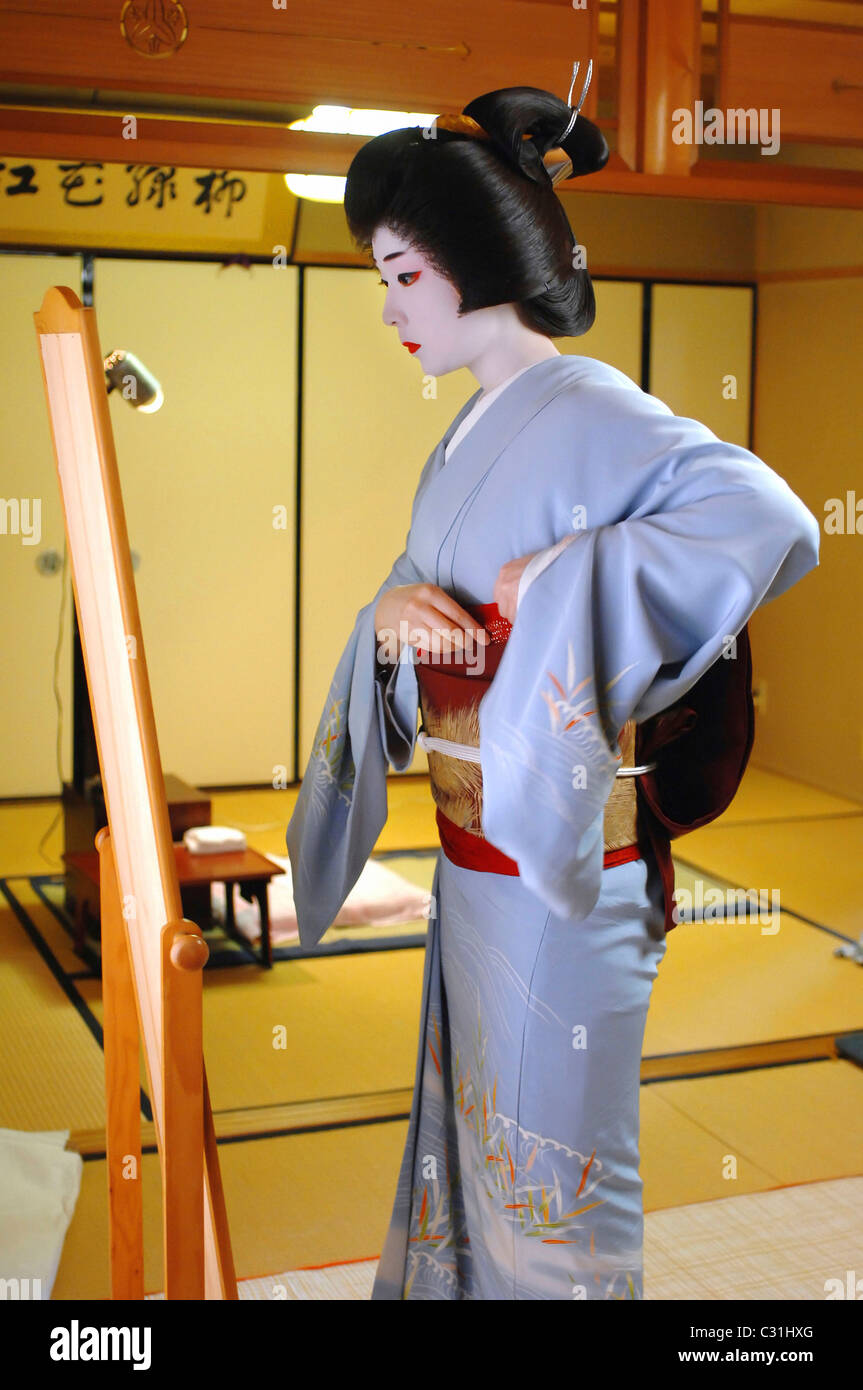 A geiko geisha dressing in her house okiya hi-res stock photography and ...