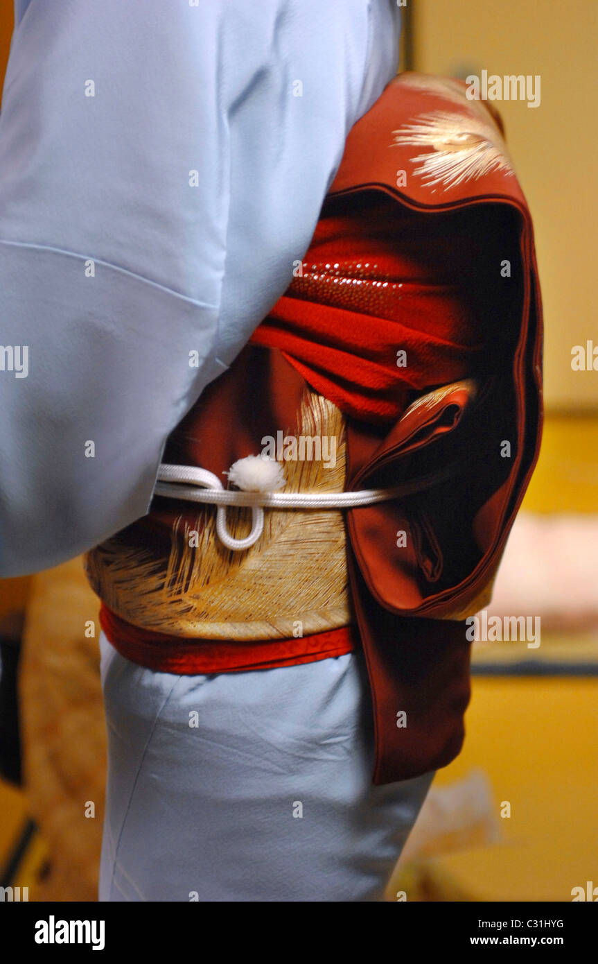 A geiko geisha dressing in her house okiya hi-res stock photography and ...