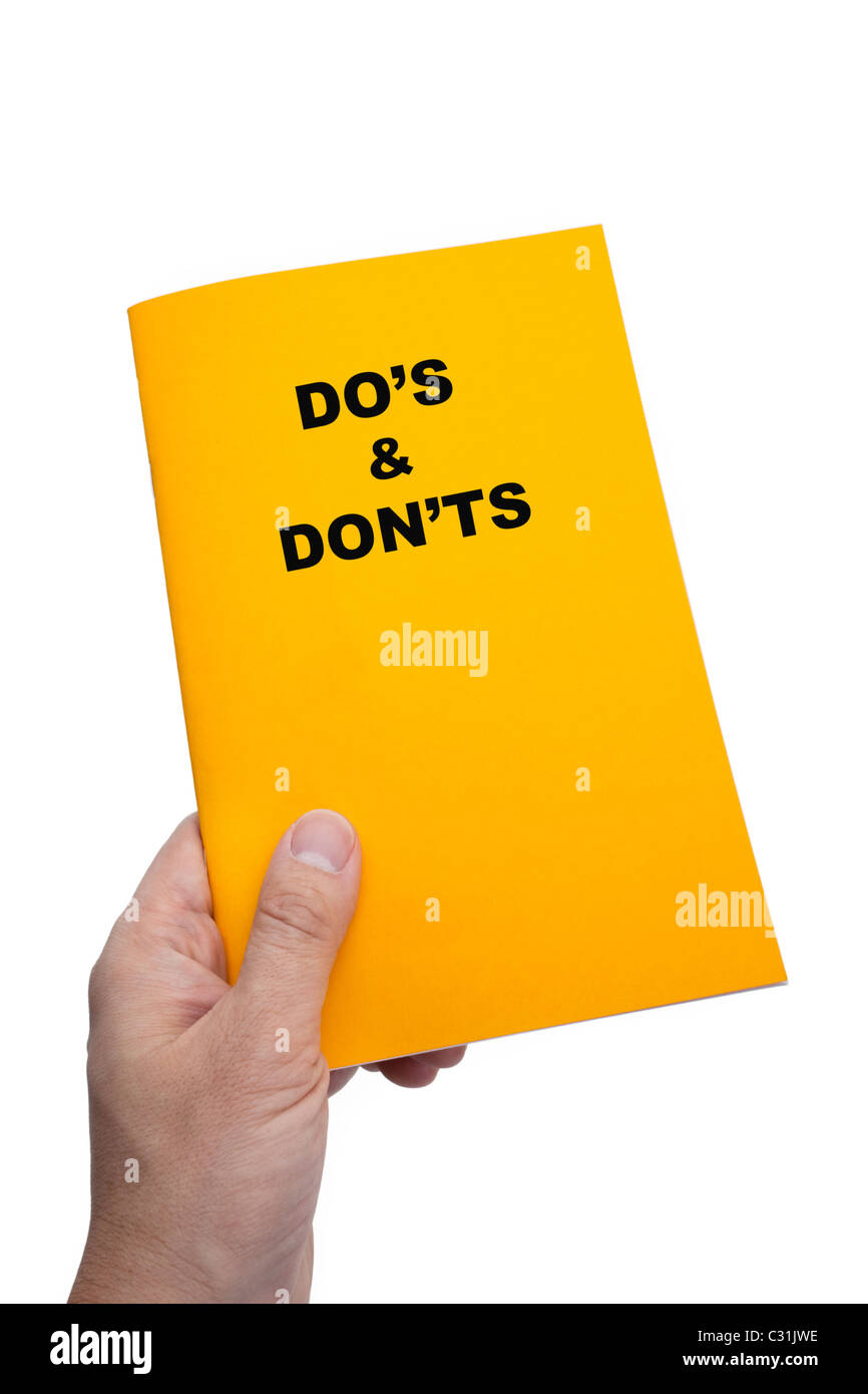 Do's & Don'ts Book with white background Stock Photo - Alamy