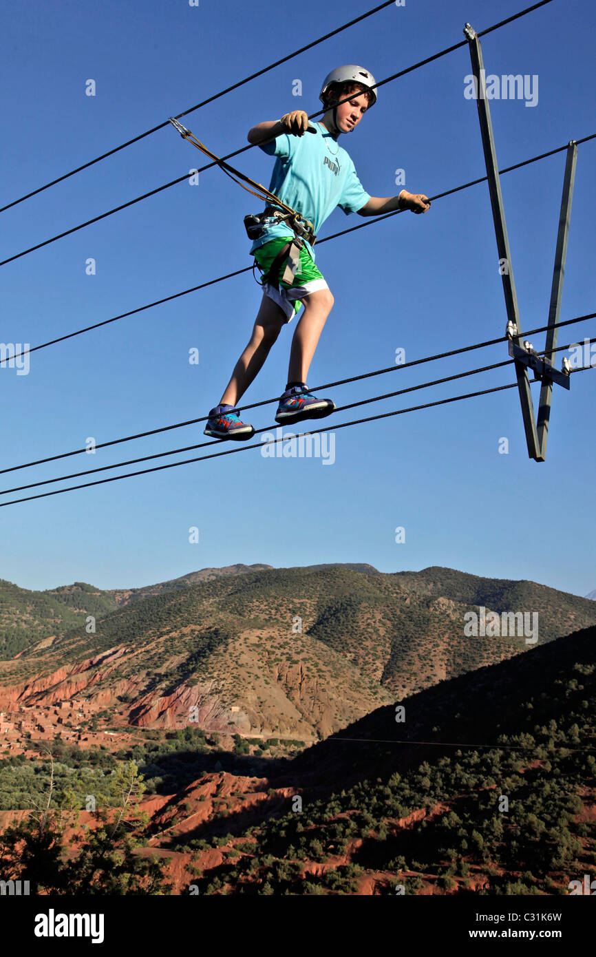 MONKEY BRIDGE HANGING BETWEEN THE RED EARTH CLIFFS, AERIAL PARK AT THE ...