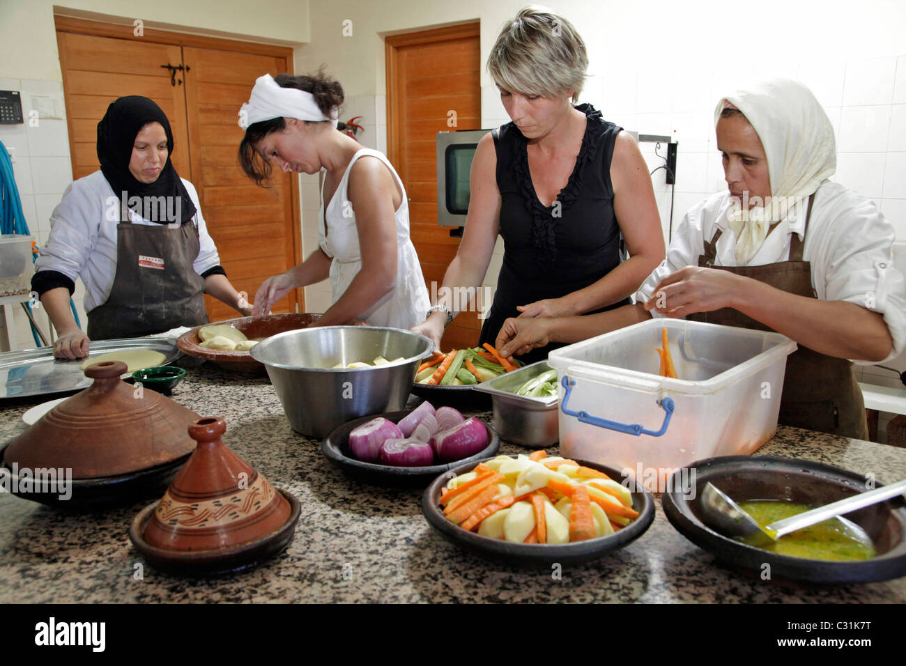 Traditional moroccan cooking classes with berber women hi-res stock ...