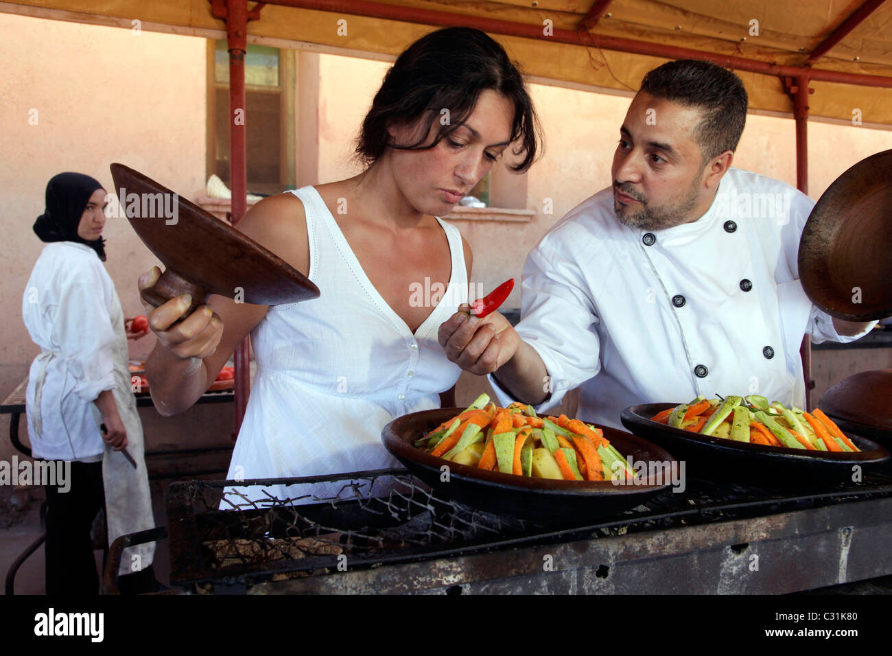 Traditional moroccan cooking classes with berber women hi-res stock ...