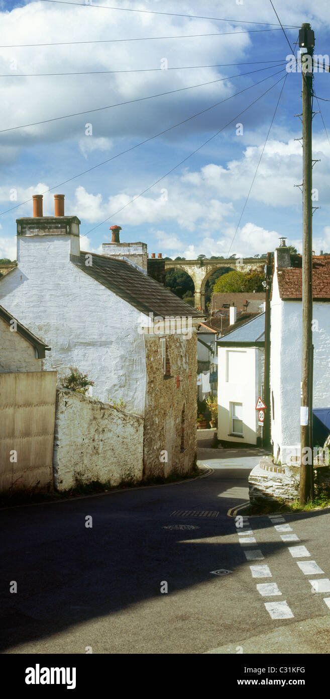 Cottages in Calstock village, Cornwall, with the railway viaduct in the ...