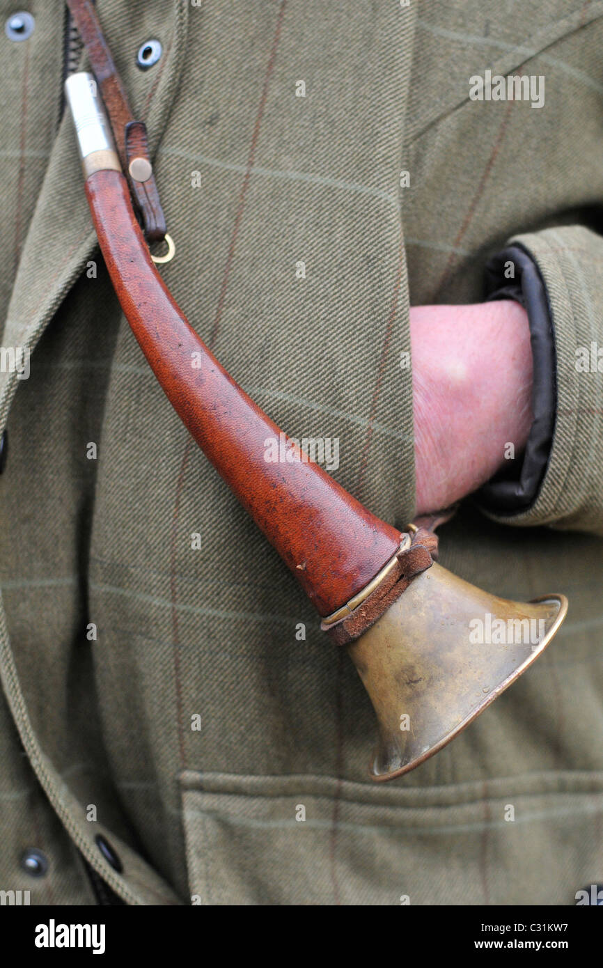 HUNTER WITH HIS HUNTING HORN, HUNTING IN A PRIVATE FOREST NEAR THE ...