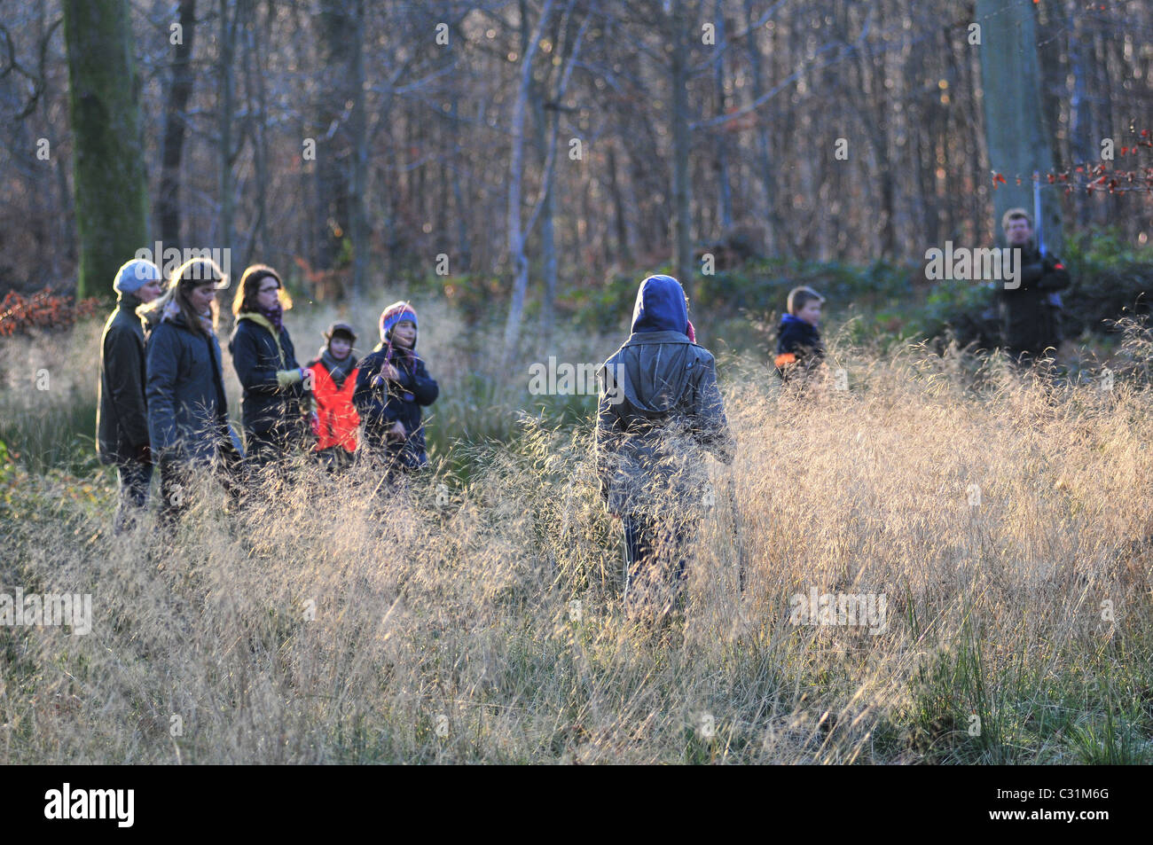 HUNTERS AND THEIR FAMILIES IN THE WOODS, HUNTING IN THE NATURE RESERVE ...