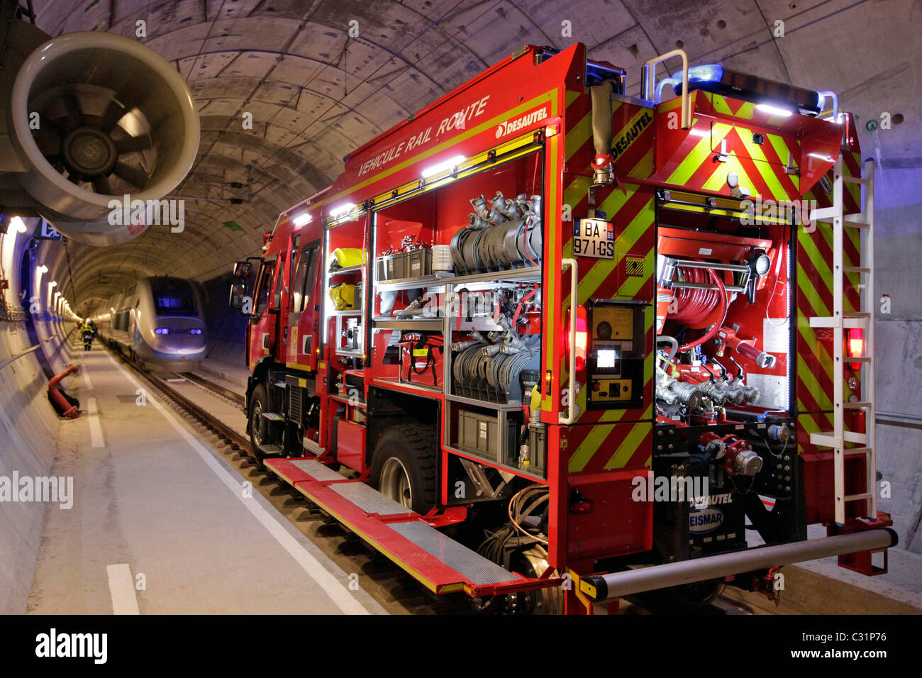 Railroad fire engine operating in the perthus tunnel hi-res stock ...